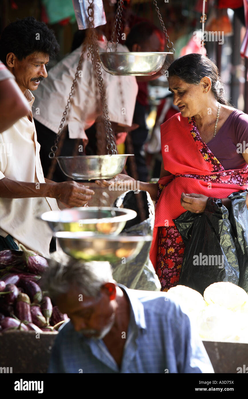 Vertical landscape detail of Kandy Central market with colourful array ...