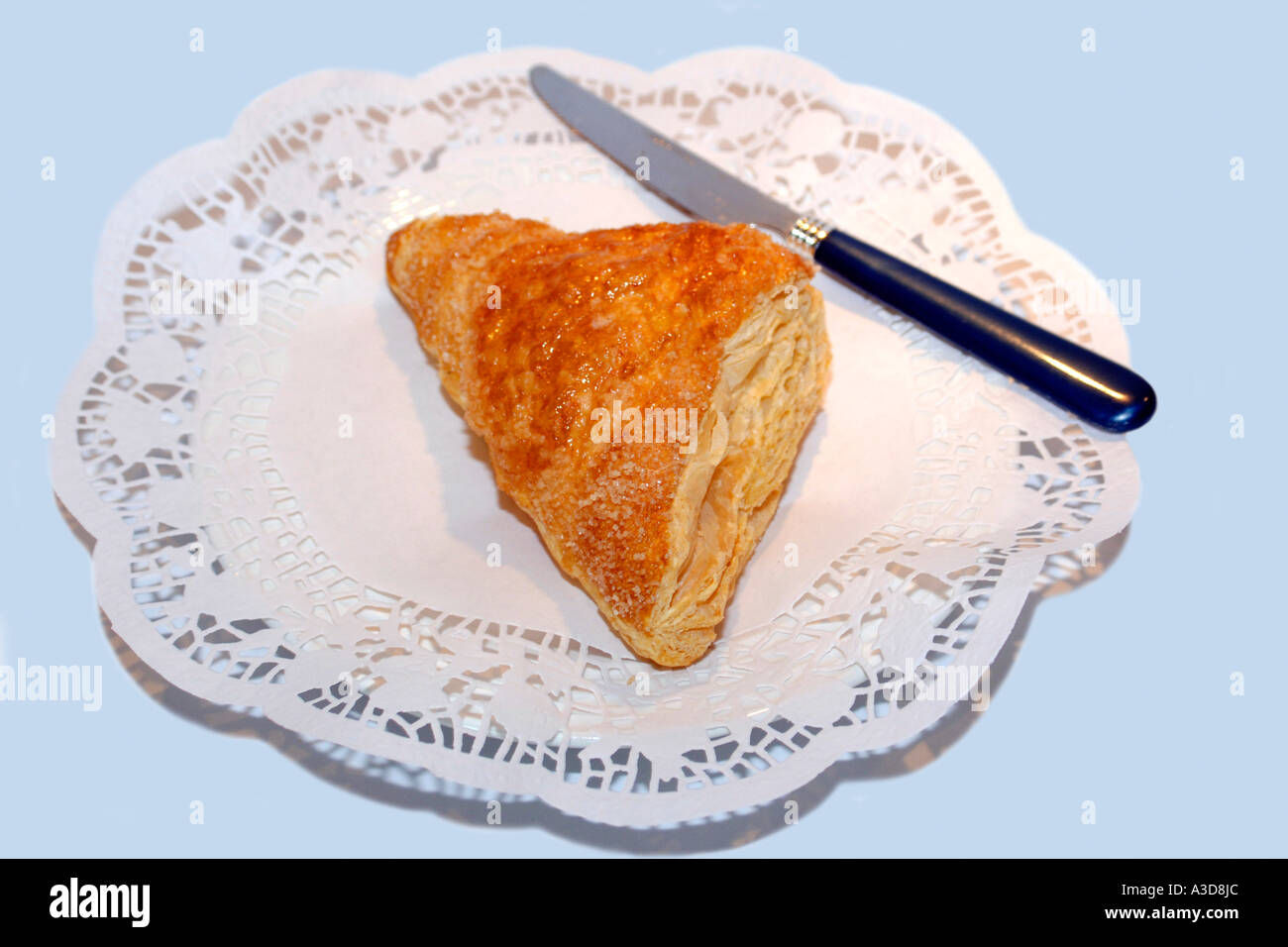 A triangular shaped Apple puff pastry cake Stock Photo - Alamy