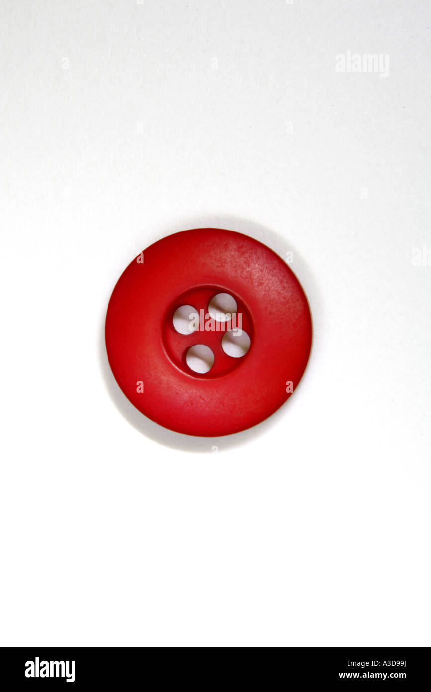 One red button isolated on white background Stock Photo - Alamy