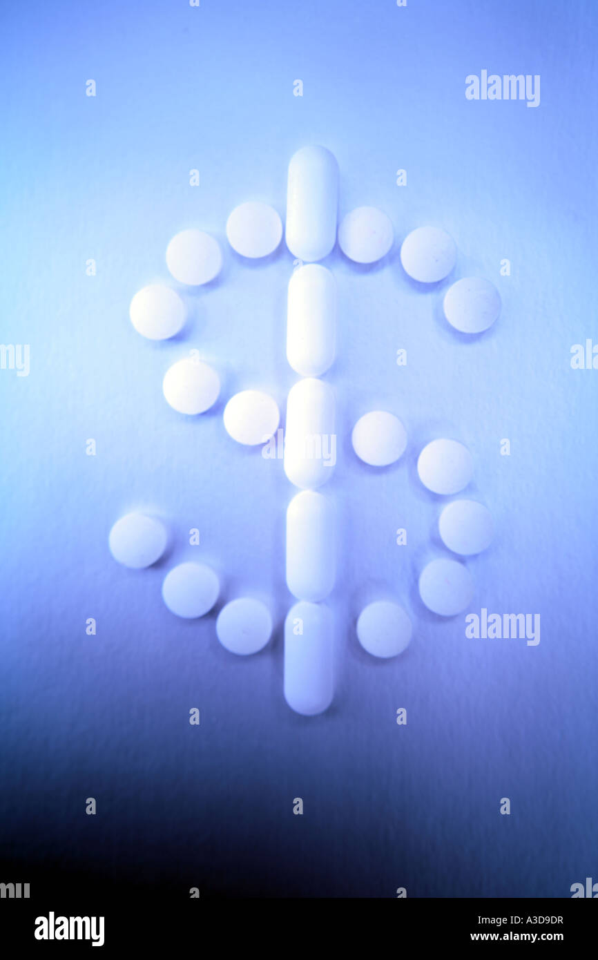 Dollar sign pills Stock Photo - Alamy