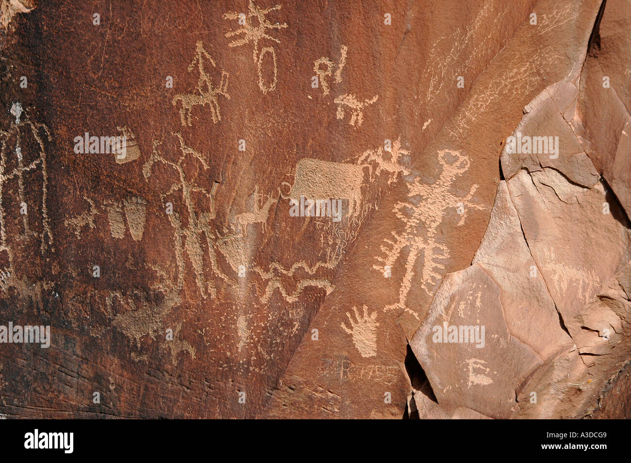 Newspaper Rock is a petroglyph panel etched in sandstone that records ...