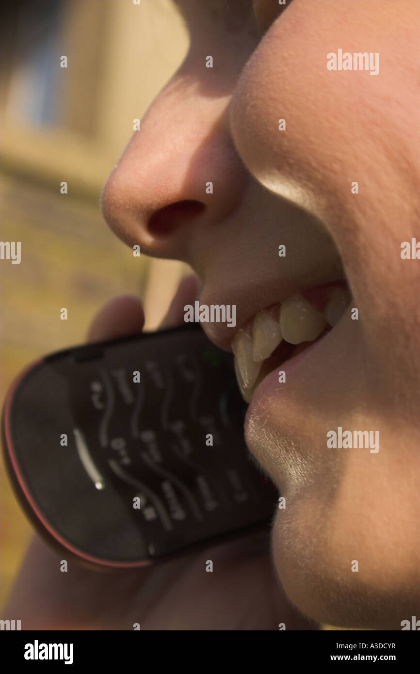 Talking / listening on a mobile phone Stock Photo - Alamy