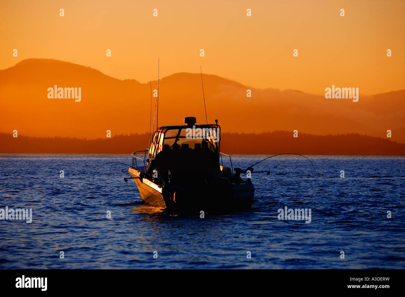 Fishing boat at sea Stock Photo - Alamy