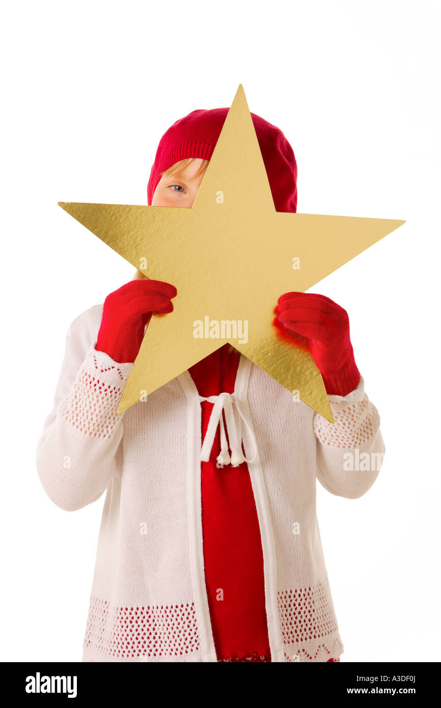 Young girl with Christmas star Stock Photo - Alamy