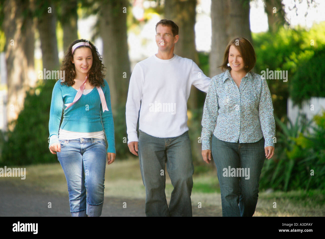 Family walking together Stock Photo - Alamy