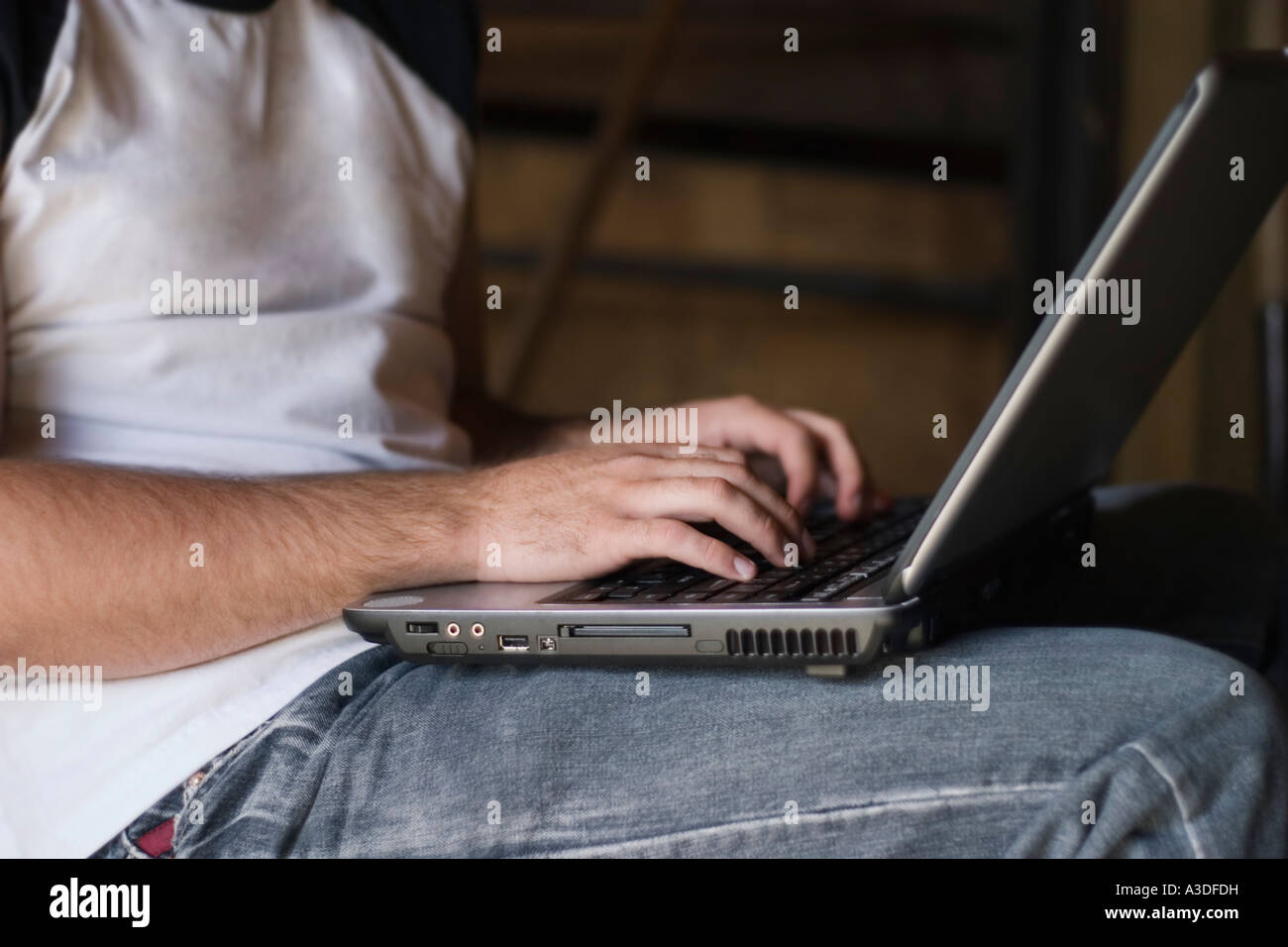 Man using a laptop Stock Photo - Alamy