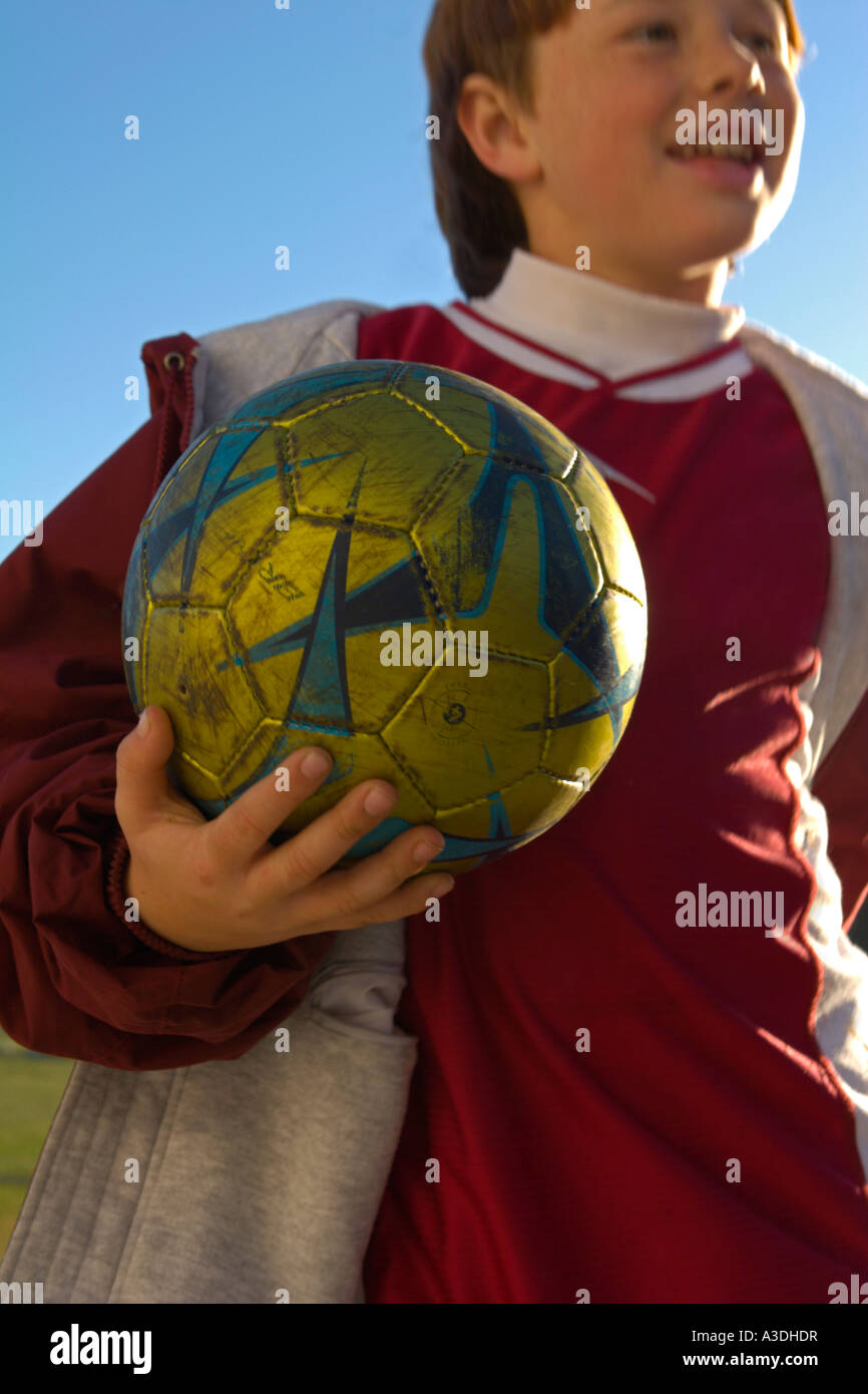 Children running after ball hi-res stock photography and images - Alamy