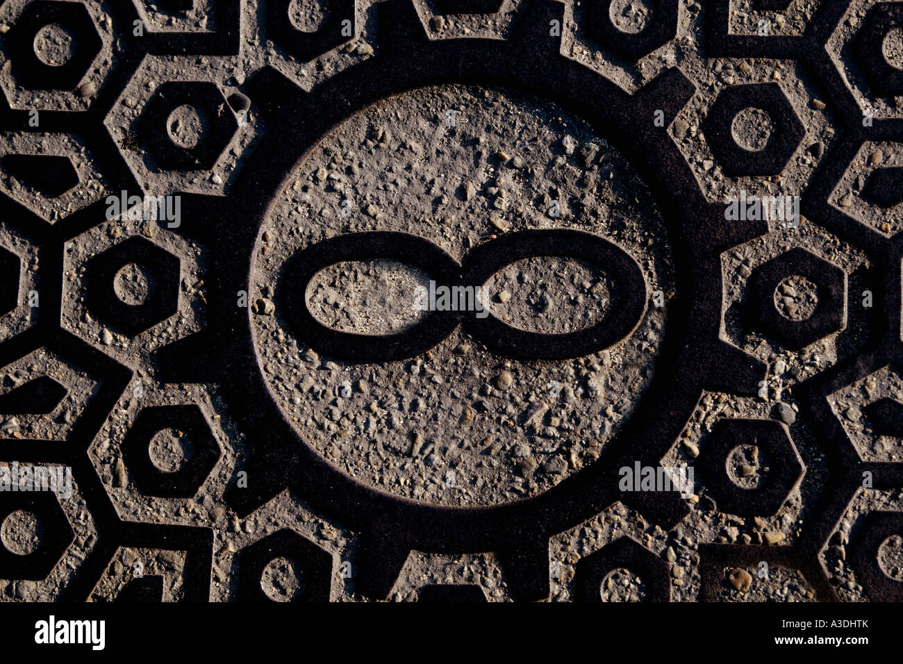 Rock carving of infinity symbol Stock Photo - Alamy