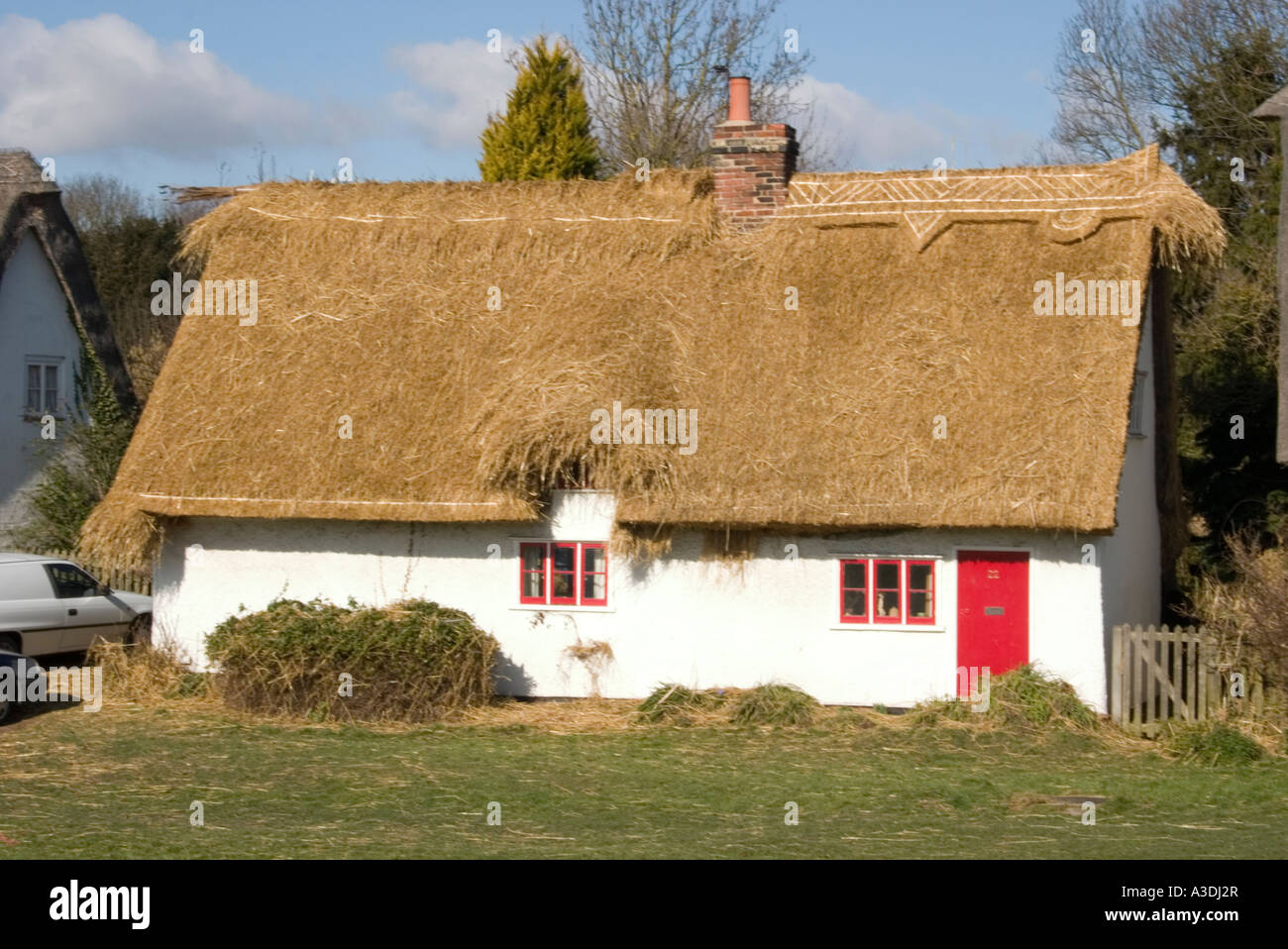 Cottage in the process of being Thatched Stock Photo - Alamy