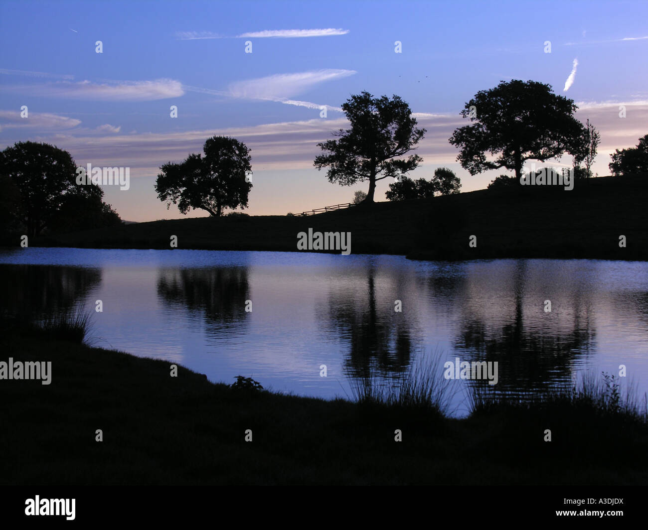 Cool blue lake and sky Stock Photo - Alamy