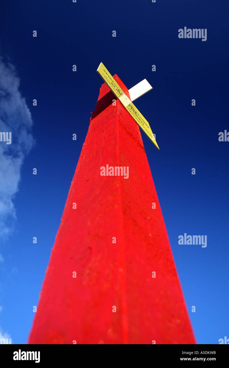 Red pole over a deep blue sky Stock Photo - Alamy