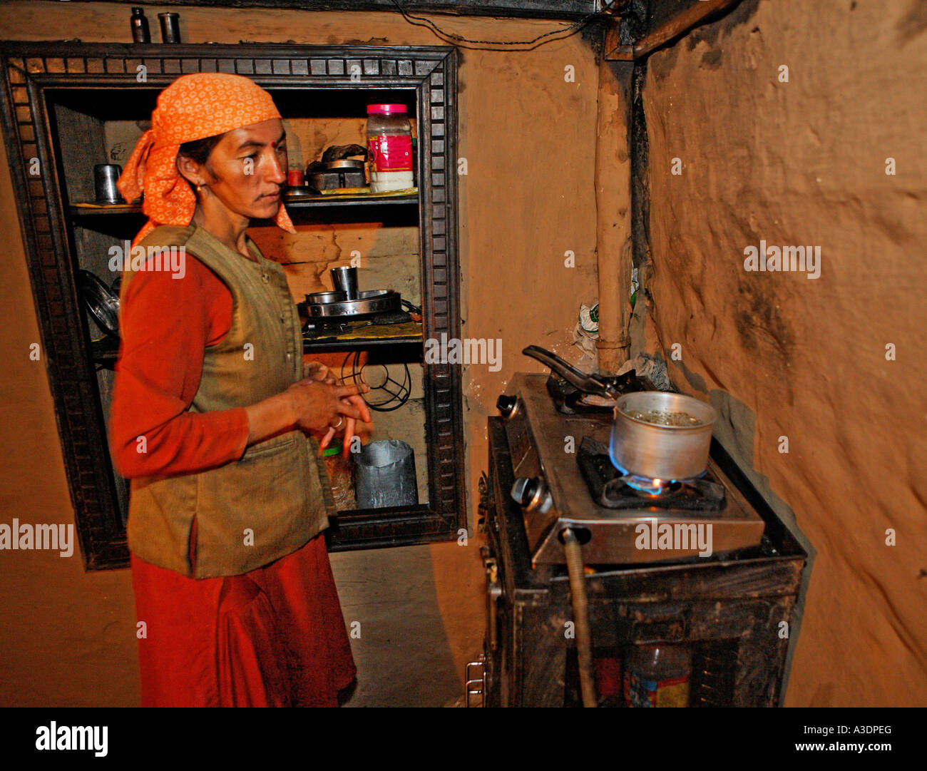 Woman in kitchen matiyama himachal hi-res stock photography and images ...
