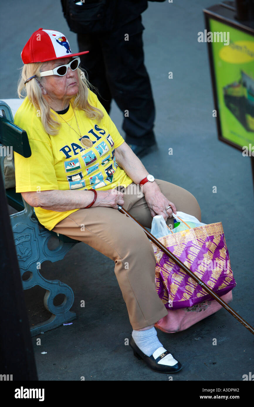Old lady tramp in paris Stock Photo - Alamy