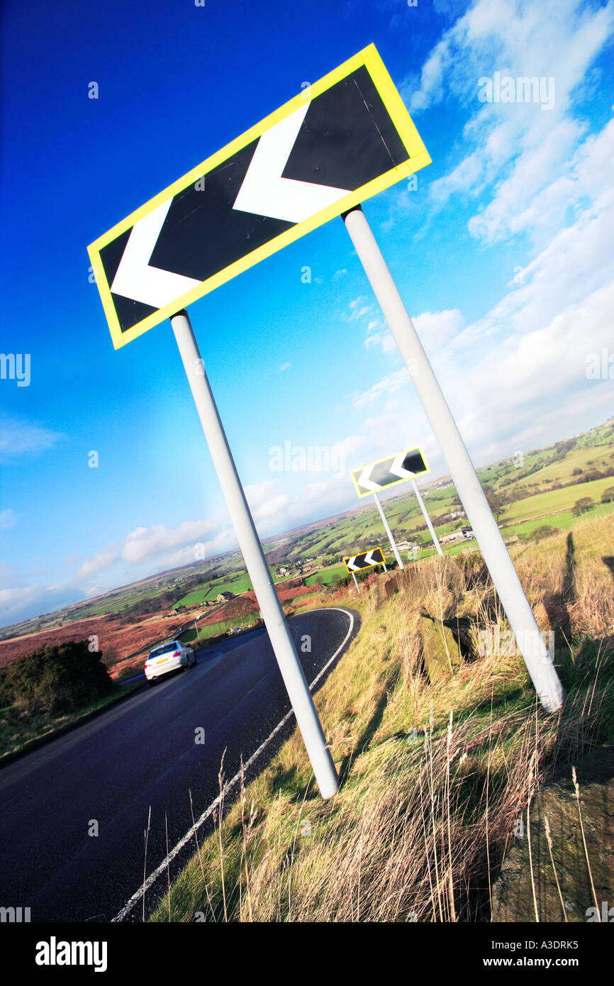 Tight corner sign in countryside road Stock Photo - Alamy