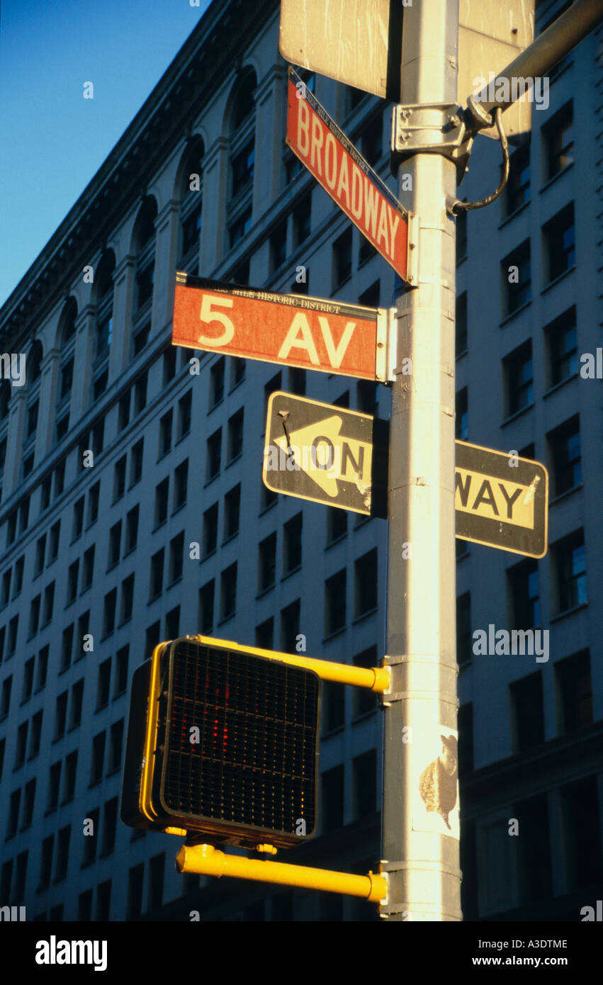 Street signs on a post at junction of 5th Avenue and Broadway, New York ...
