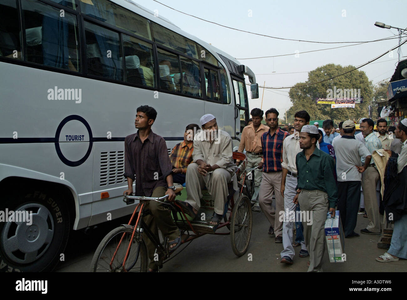 A tourist bus in the crowded streets of Old Delhi in India Stock Photo ...