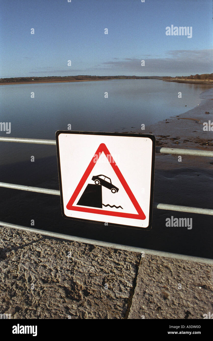 danger of cars falling into sea warning Stock Photo - Alamy