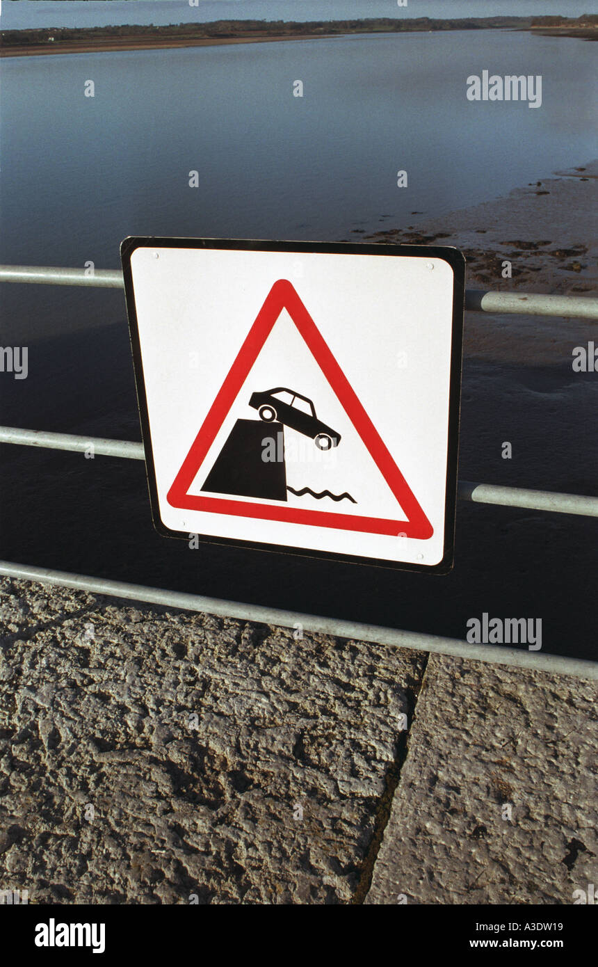 danger of cars falling into sea warning Stock Photo - Alamy