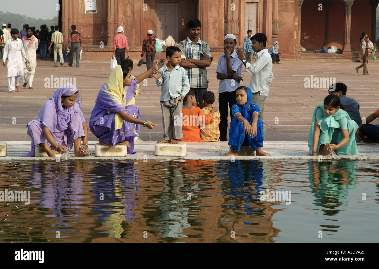 People washing before prayer at the Jami Masjid Mosque in Delhi India ...