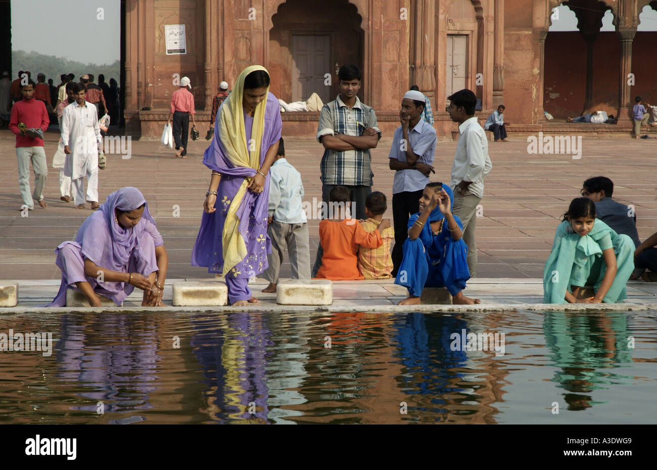 People washing before prayer at the Jami Masjid Mosque in Delhi India ...