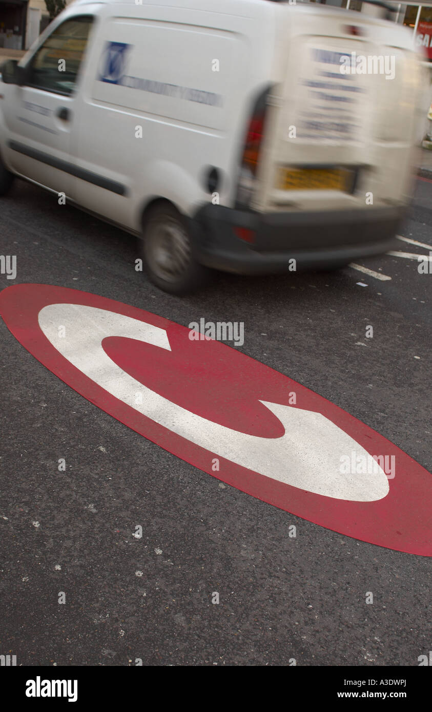 White on red C road sign at entrance of congestion charge zone London ...