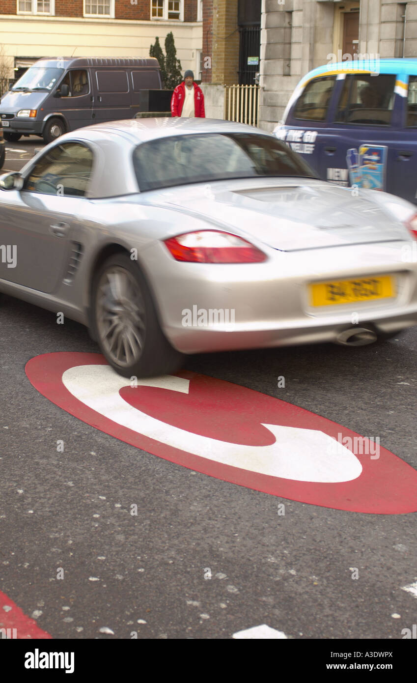 White on red C road sign at entrance of congestion charge zone London ...