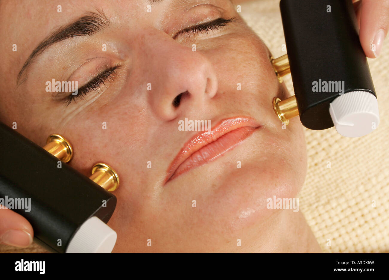 Muscle stimulation with electrodes for skin tightening and muscle ...