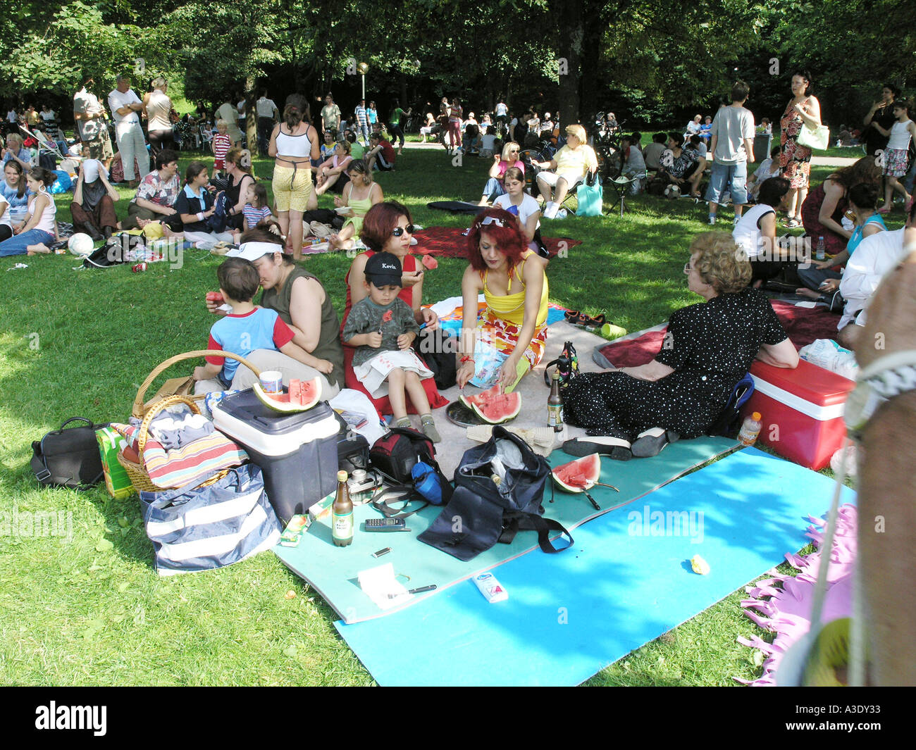 Family having Picnic under tree shadow in Park, Munich Germany Europe ...