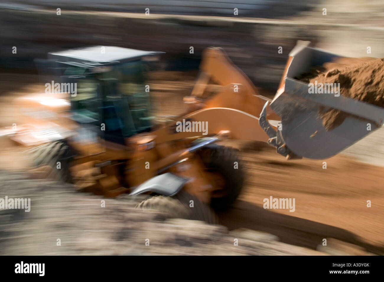 Front-End Loader Moving Dirt At Residential Construction Site, Colorado ...