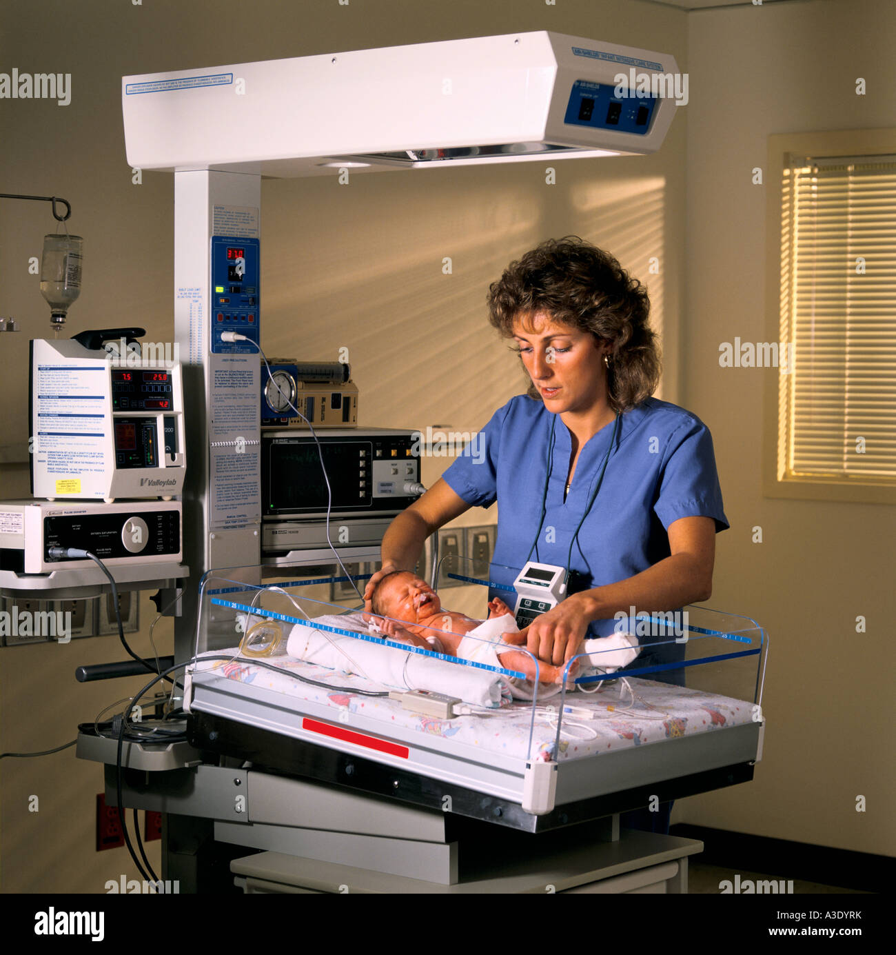 Nurse And Newborn In Hospital'S Neo-Natal Intensive Care Unit Stock ...