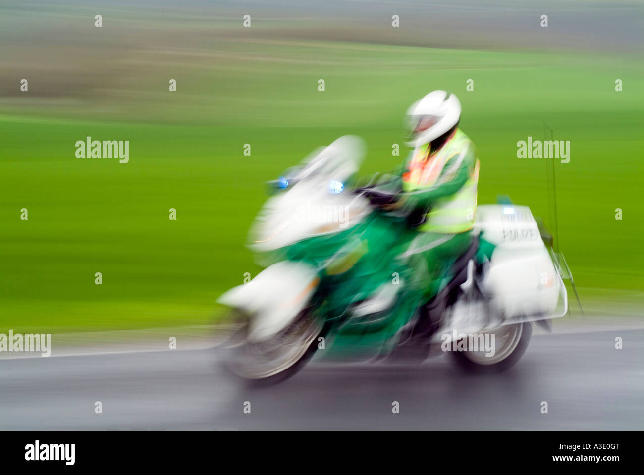 German Police Bike in a hurry, blurred Stock Photo - Alamy