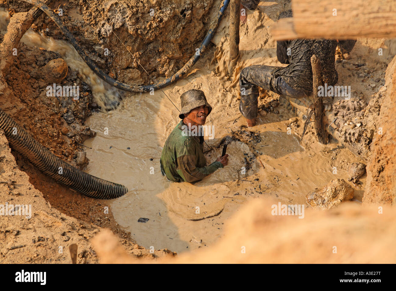Worker in diamond mine, Cempaka, South-Kalimantan, Borneo, Indonesia ...