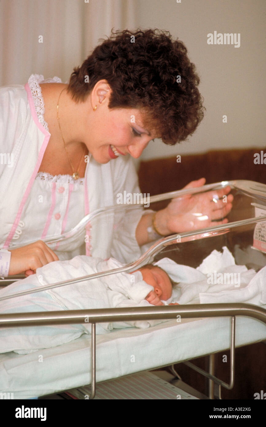 Woman with new born baby hi-res stock photography and images - Alamy