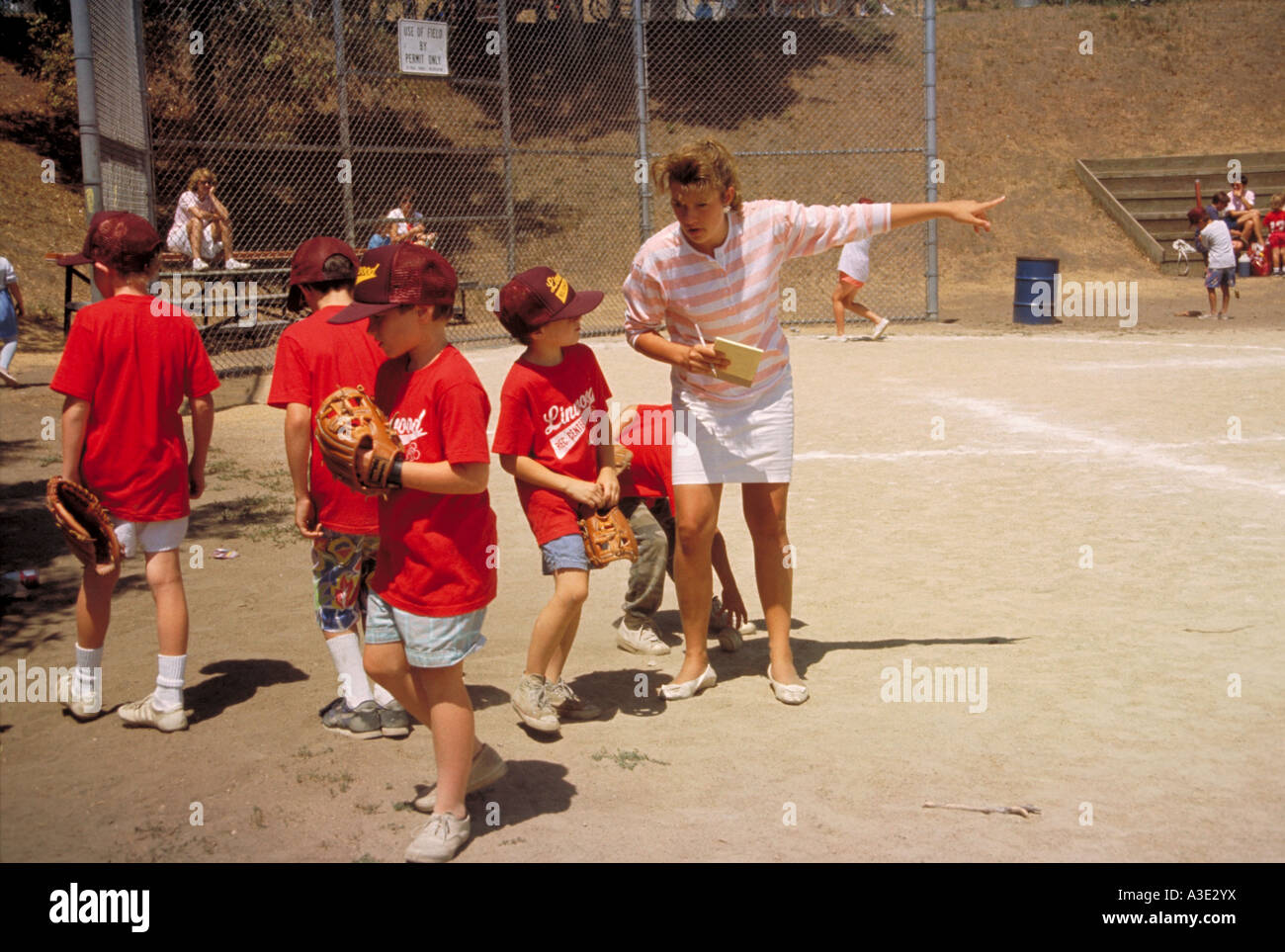 Coaching softball hi-res stock photography and images - Alamy