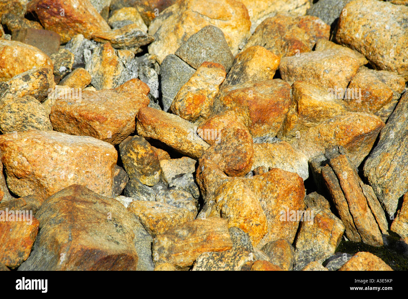 Rust brown coloured rocks granit Eastgreenland Stock Photo - Alamy
