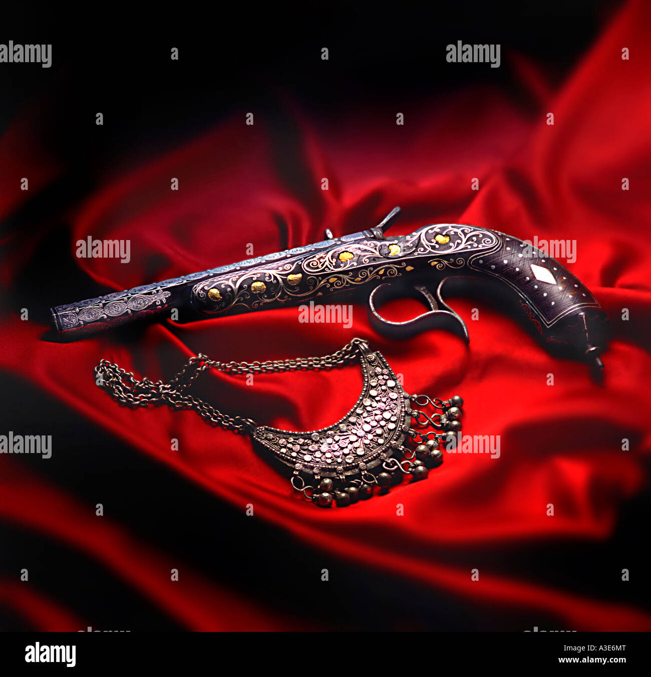Arabian pistol with arabian jewelry Stock Photo - Alamy