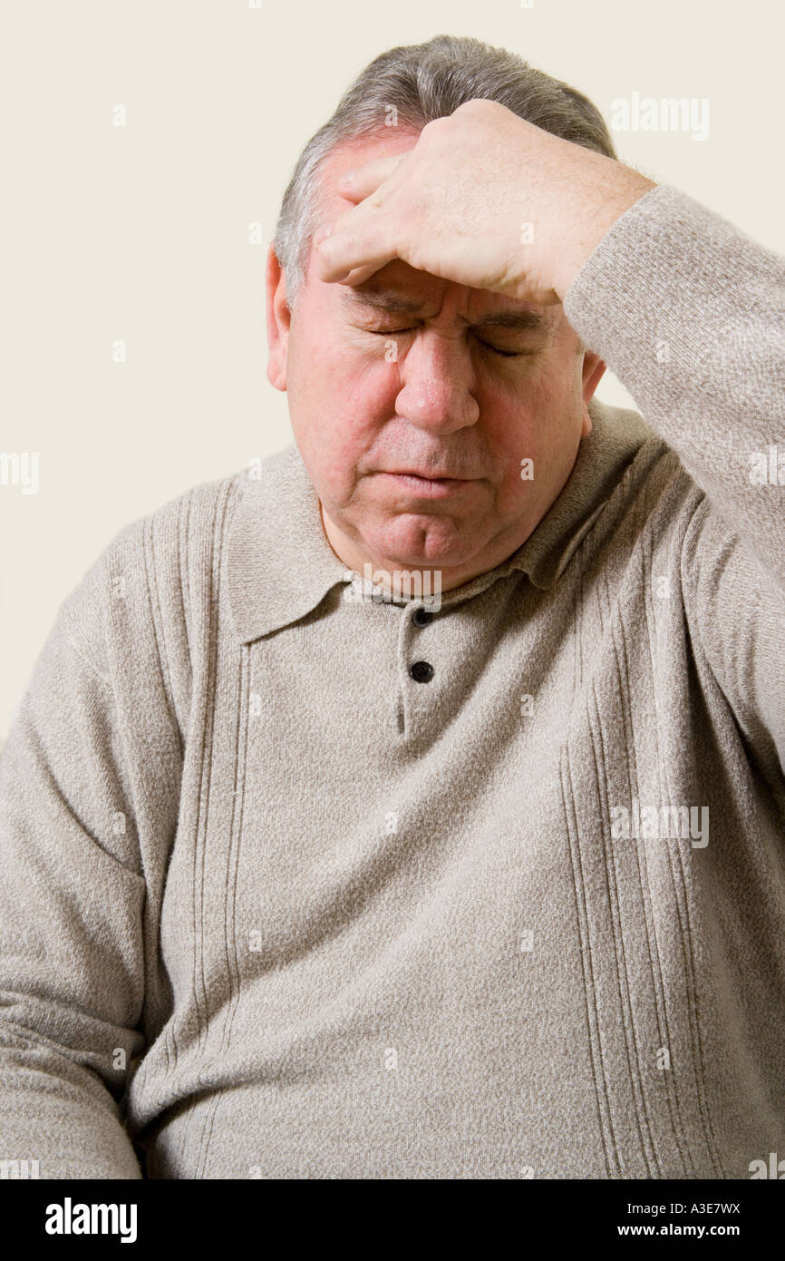 Man experiencing headache Stock Photo - Alamy