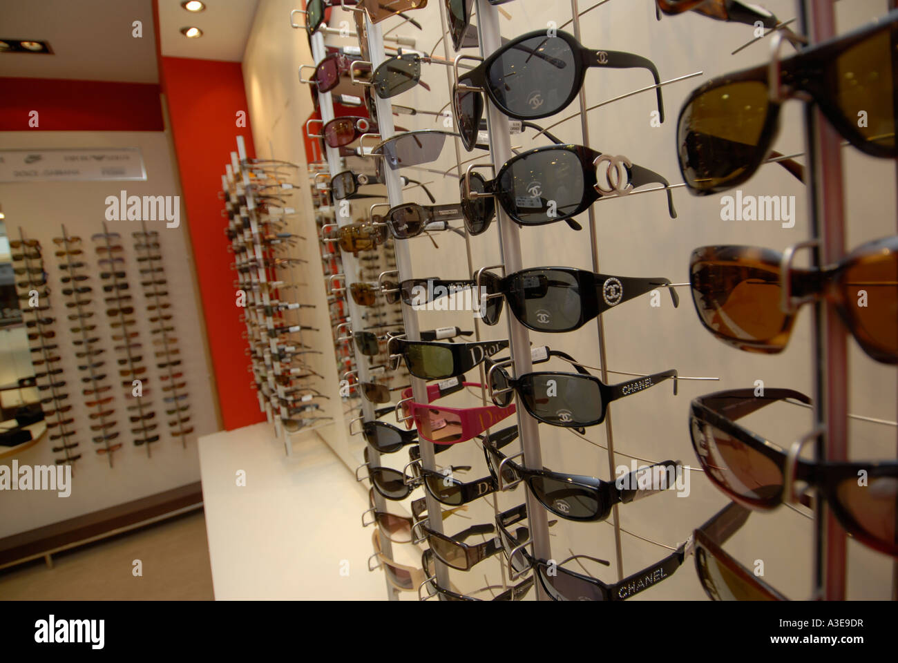 Sunglasses and glasses in a shop Stock Photo - Alamy