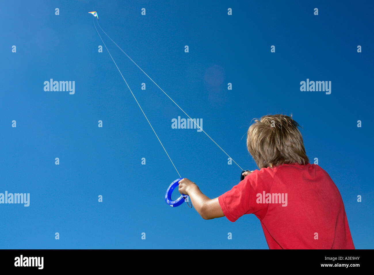 Boys fly kite hi-res stock photography and images - Alamy