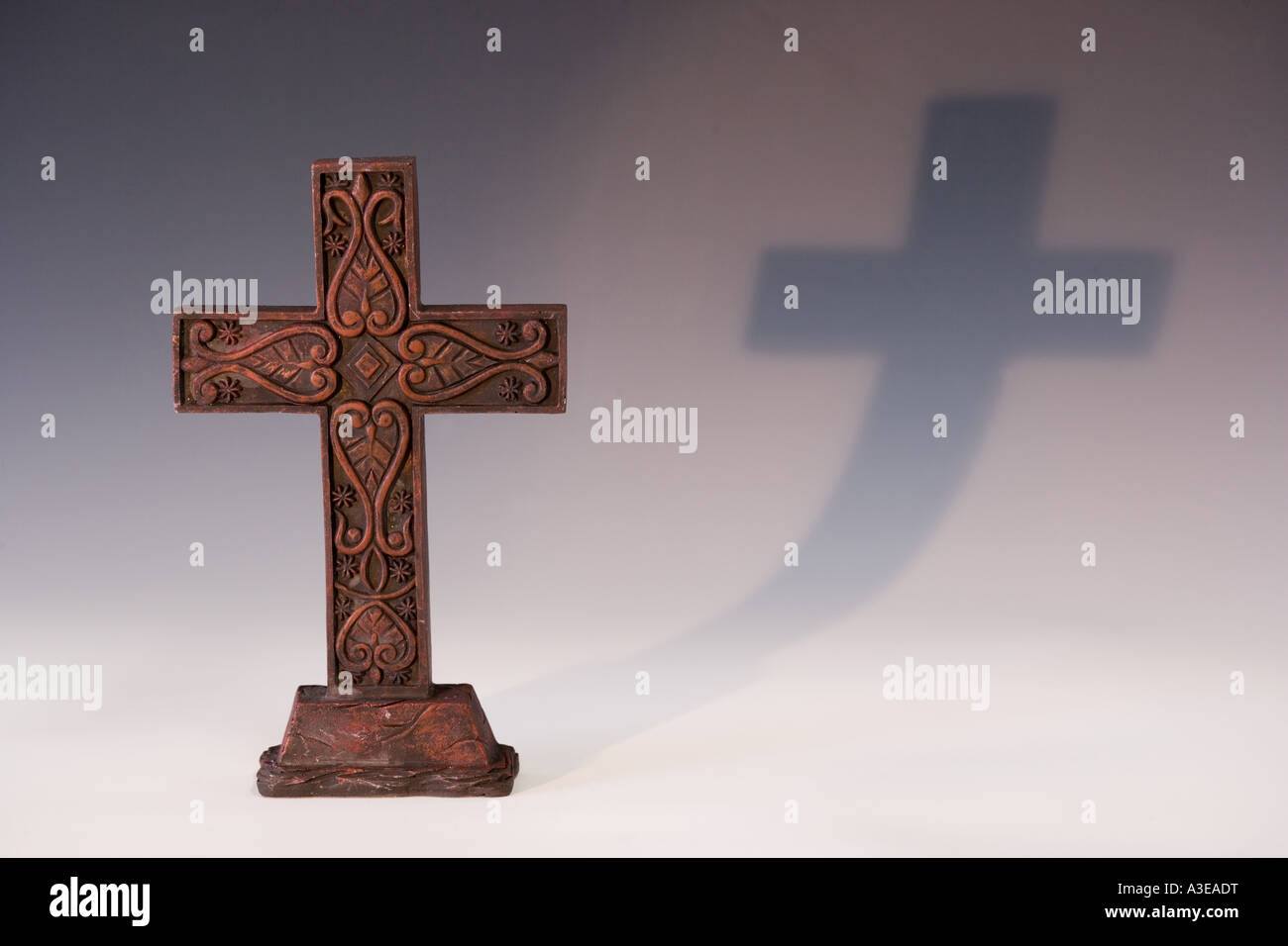 Cross with shadow Stock Photo - Alamy
