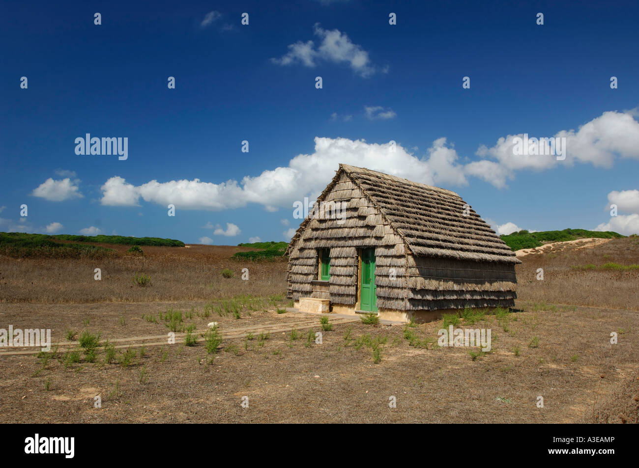 Traditional fisher hut with cattail roof and walls, Sinis, Sardinia ...