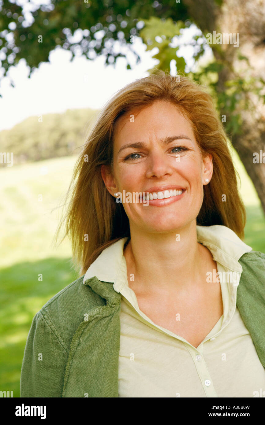 Portrait of a mid adult woman smiling Stock Photo - Alamy