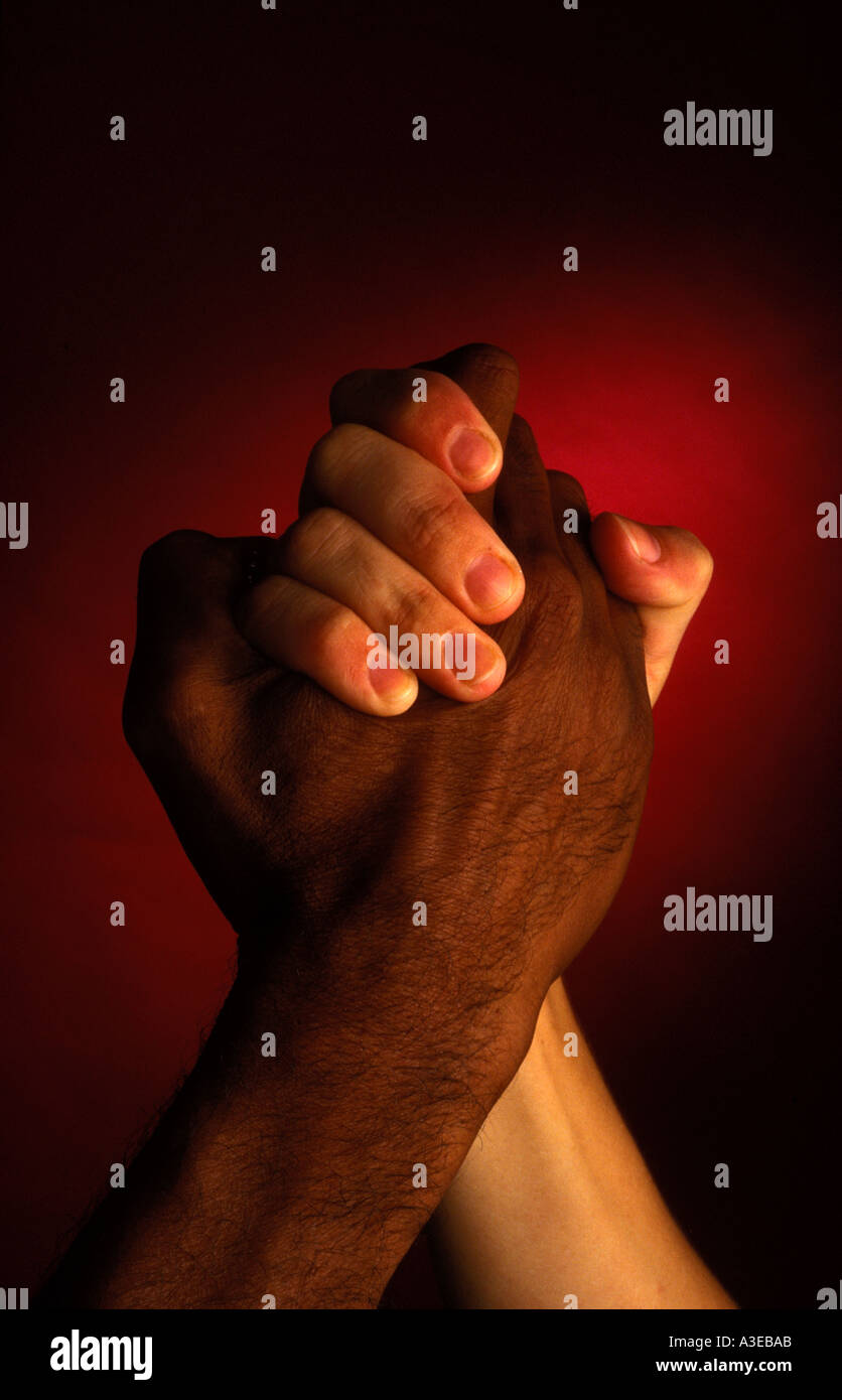 Clasped hands 0572 Stock Photo - Alamy