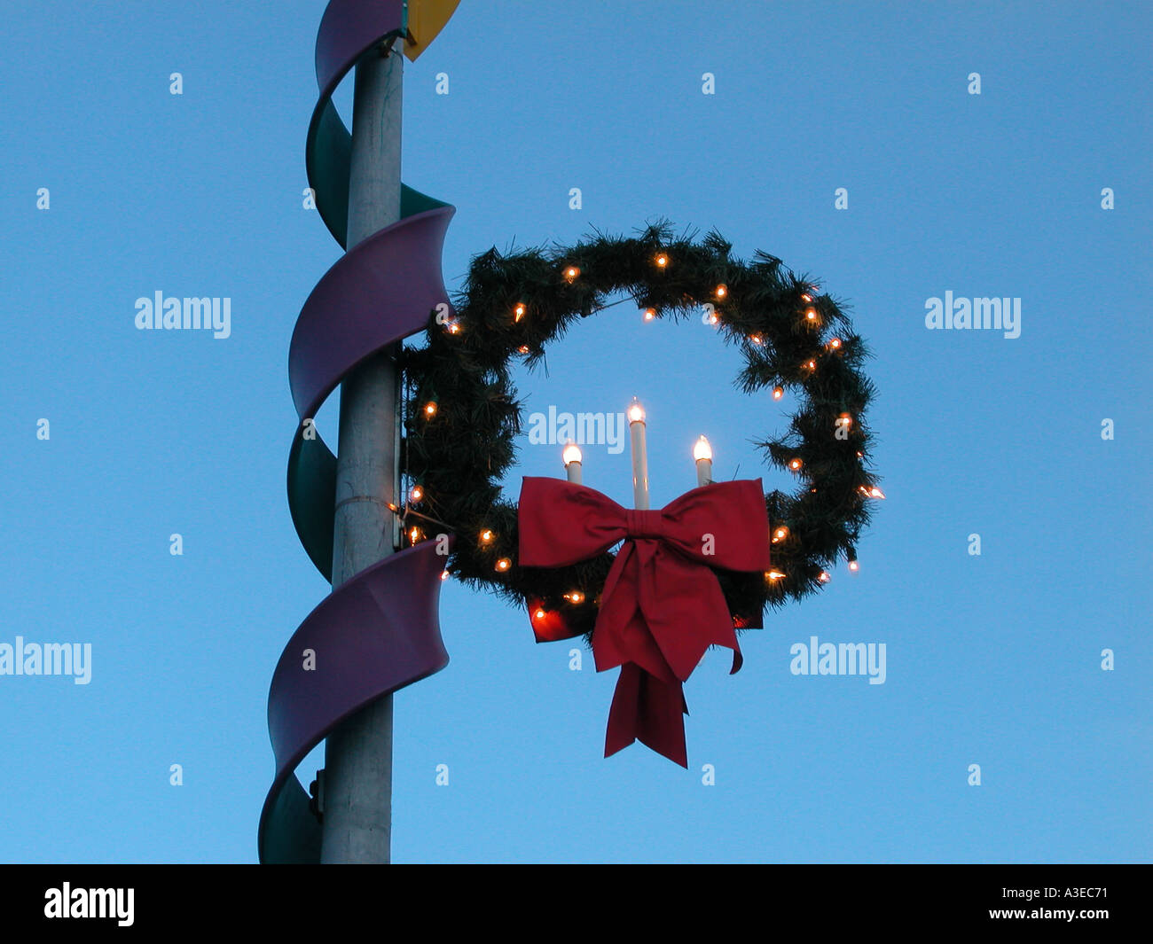 Christmas decoration on a light pole USA Stock Photo - Alamy