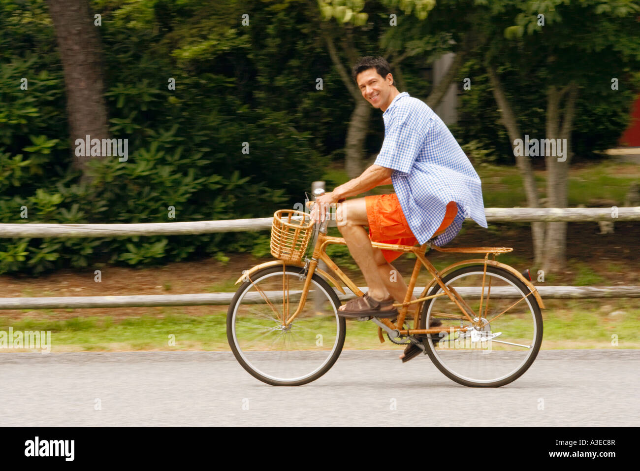 Side profile of a mature man cycling Stock Photo - Alamy