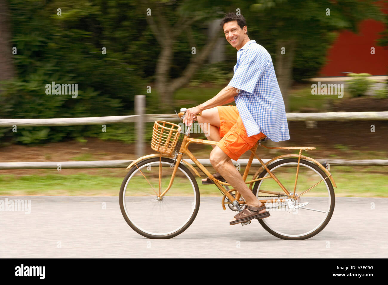 Side profile of a mature man cycling Stock Photo - Alamy