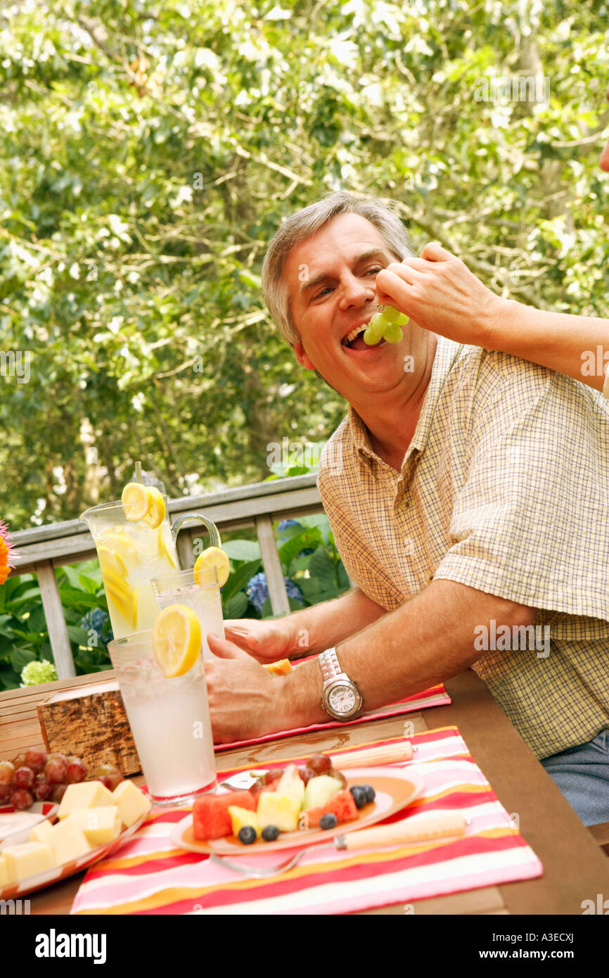 Man feeding woman fat hi-res stock photography and images - Alamy