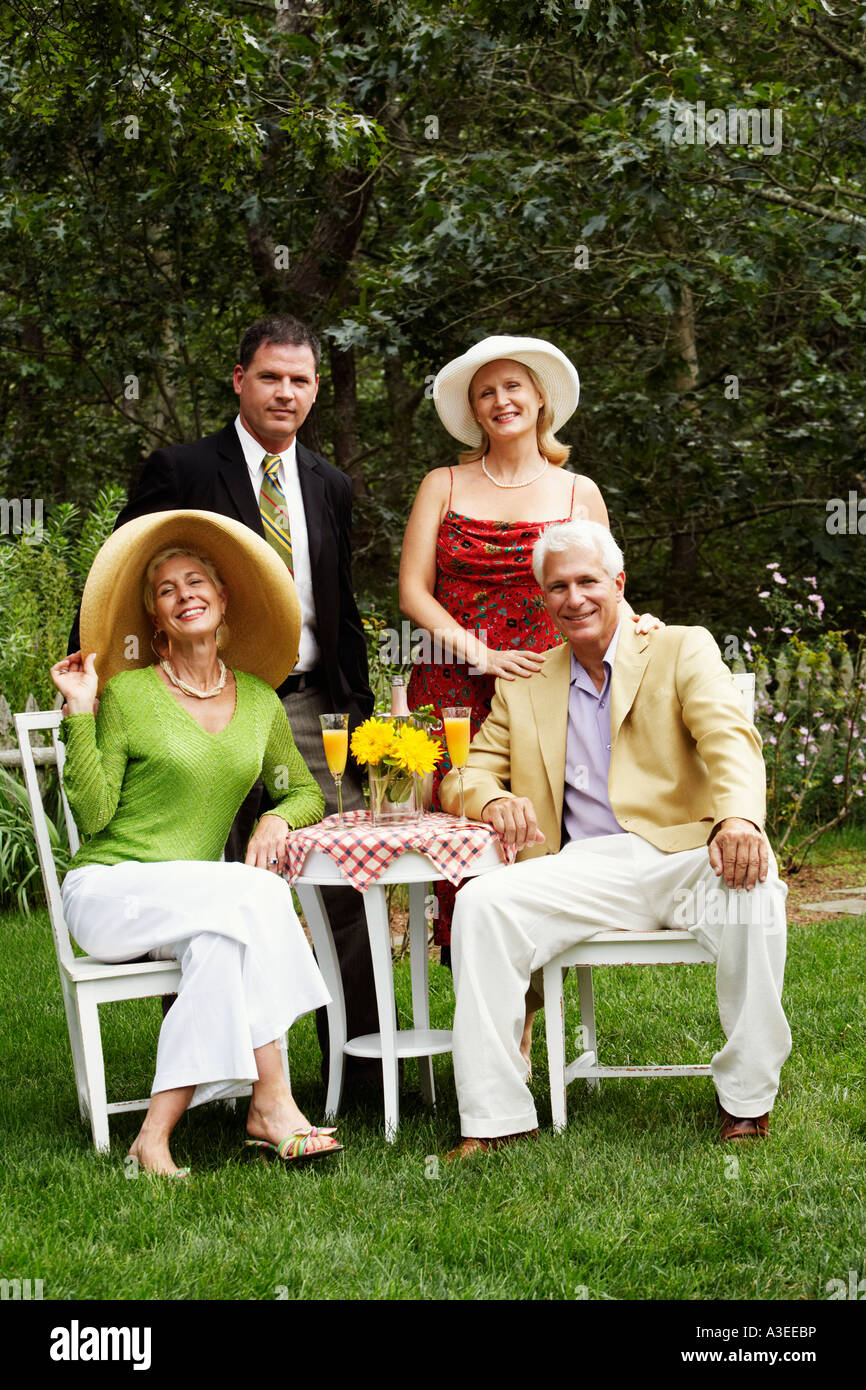 Four seniors back view table hi-res stock photography and images - Alamy