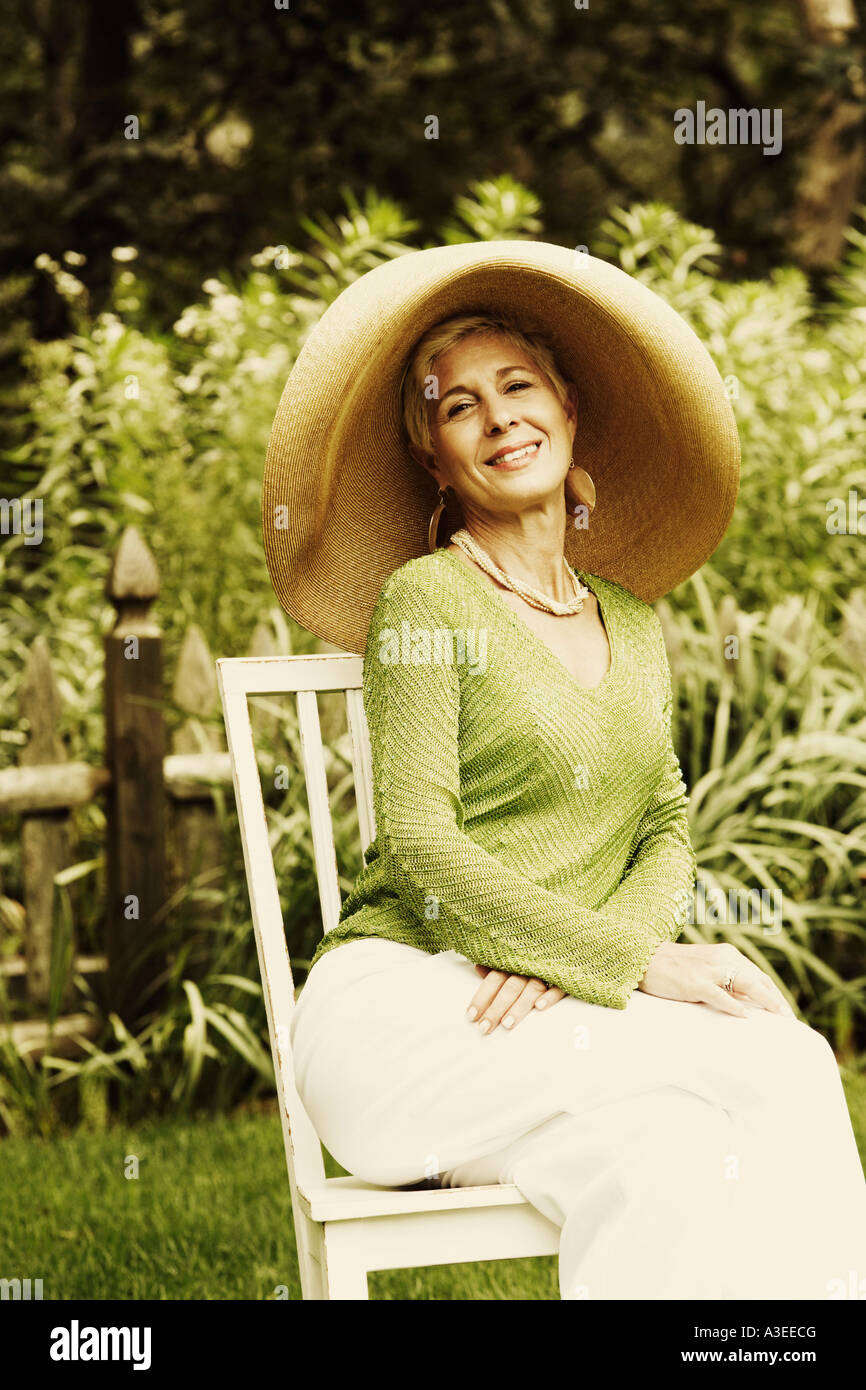 Portrait of a senior woman smiling Stock Photo - Alamy