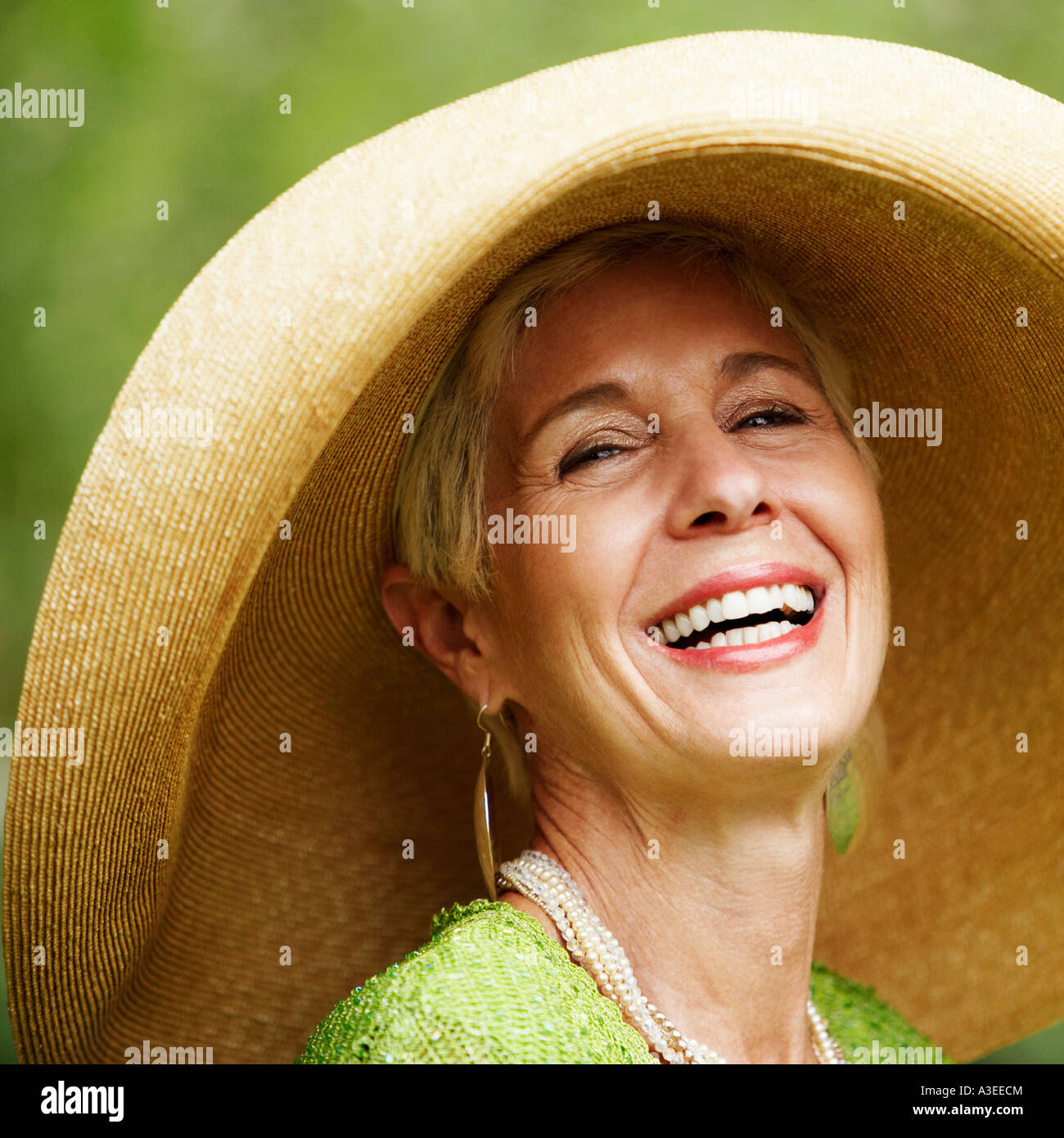 Portrait of a senior woman smiling Stock Photo - Alamy